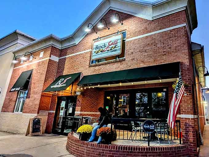 That brick facade and welcoming patio practically whisper "come on in, we've been waiting for you."