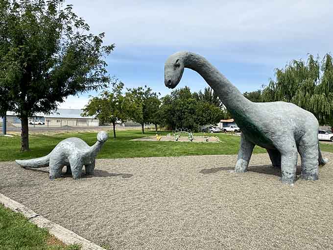The dynamic duo of Granger's Jurassic scene, standing guard like the world's friendliest prehistoric security team.