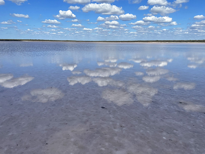Those clouds reflecting in the shallow water create a scene that looks almost too perfect to be Texas.