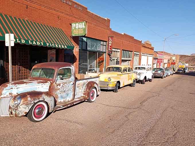When chrome met desert sun, magic happened on this street where vintage beauties line up like automotive royalty.