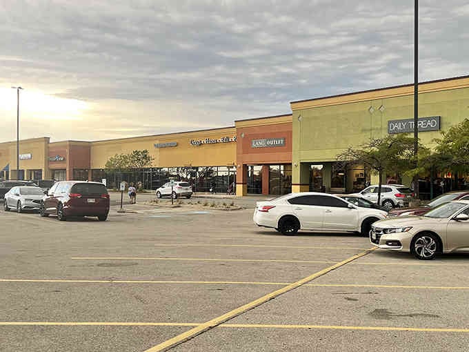 The outdoor layout means you can actually see the sky while shopping, a revolutionary concept in outlet mall design.