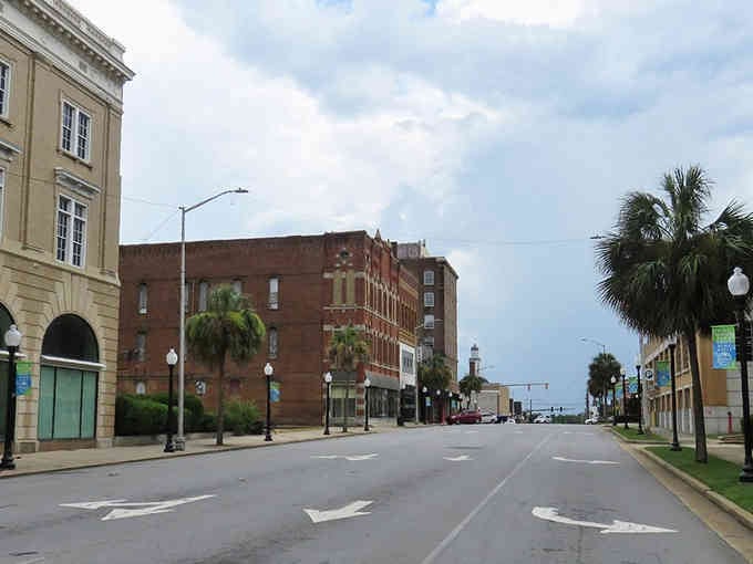 Palm trees and historic buildings create a downtown that feels like stepping into a gentler era.