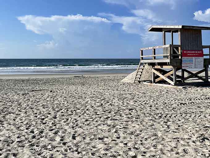 Miles of pristine sand stretch before you like nature's own welcome mat to paradise.