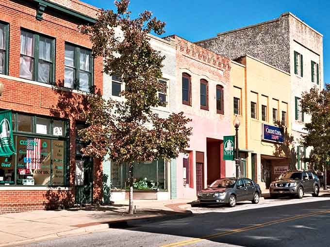 These colorful facades aren't trying to impress anyone, just quietly doing their job for over a century.