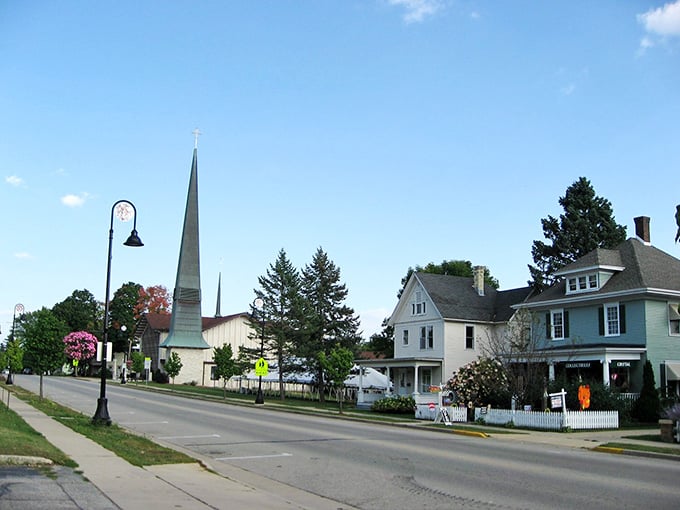 That church steeple reaching skyward reminds you some towns still know how to do classic American beauty right.