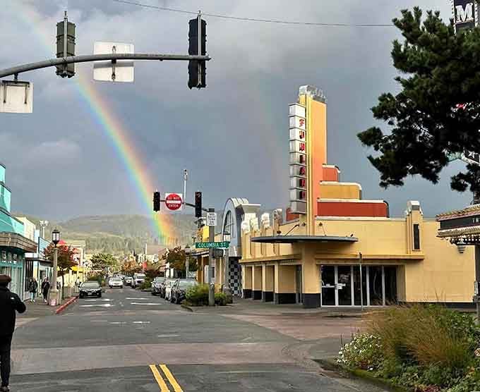 That rainbow arching over Broadway feels like nature's way of pointing you toward hidden treasures waiting inside those vintage shops.