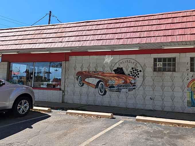 The vintage vibe starts outside with murals that'll make any car enthusiast's heart race faster.