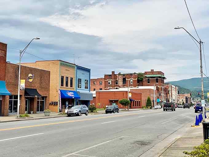 Downtown Middlesboro stretches out like a postcard from America's heartland, mountains standing guard in the distance.