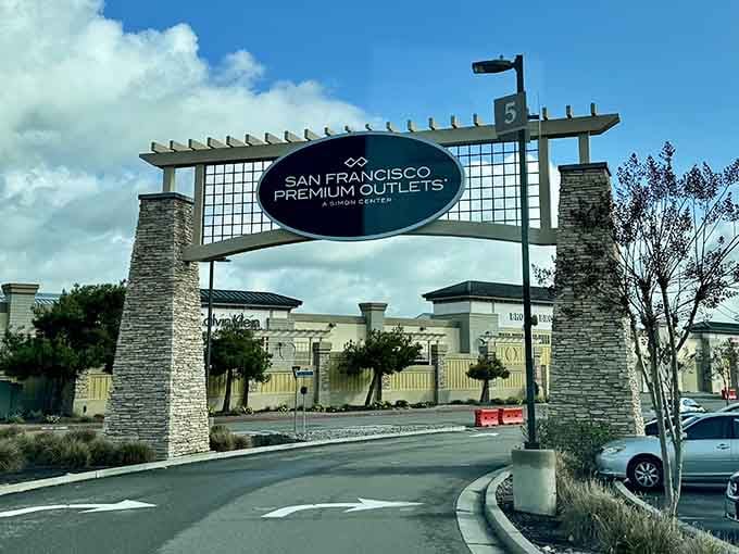 That entrance sign isn't just welcoming you to a mall&mdash;it's inviting you to financial redemption through strategic shopping.