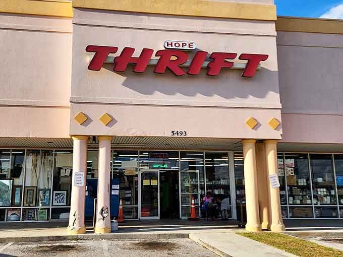 Hope Thrift Store's entrance welcomes bargain hunters to a world where twenty-five dollars performs actual miracles.