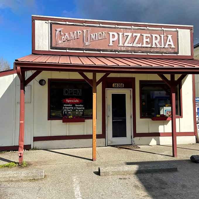 The red metal roof and classic signage promise old-school pizza perfection in the heart of tiny Seabeck.