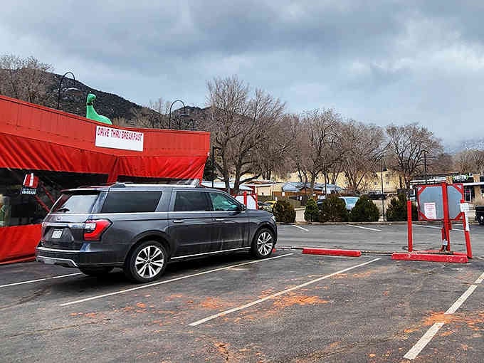 The parking lot dining room where SUVs and sedans alike gather for charcoal-grilled perfection, no reservations required.
