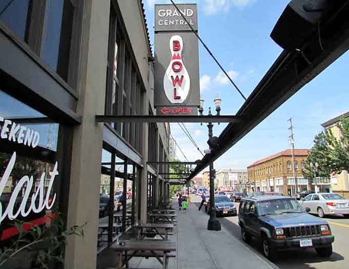That vintage bowling pin sign towers over the street like a beacon calling you to dinner and strikes.