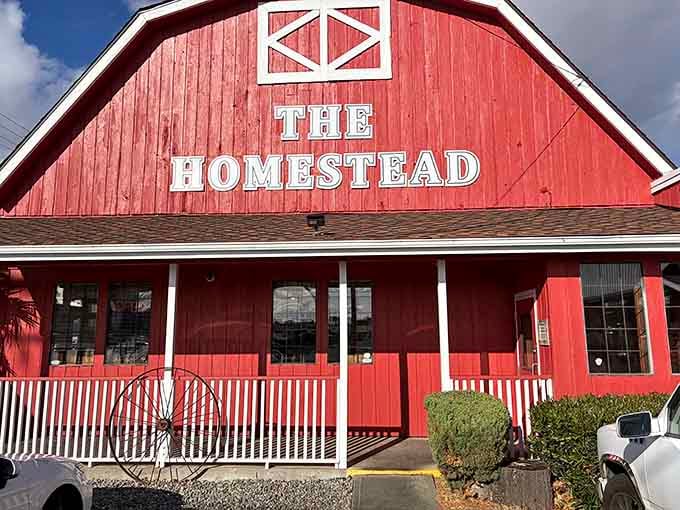 The Homestead stands proud and red, like it's daring you to drive past without stopping for biscuits.