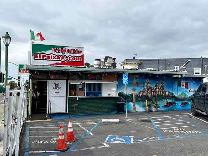 That cheerful Mexican flag and colorful mural tell you everything you need to know before you even walk in.