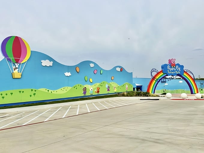 That rainbow archway isn't just an entrance, it's a portal to a world where cartoon physics apply.