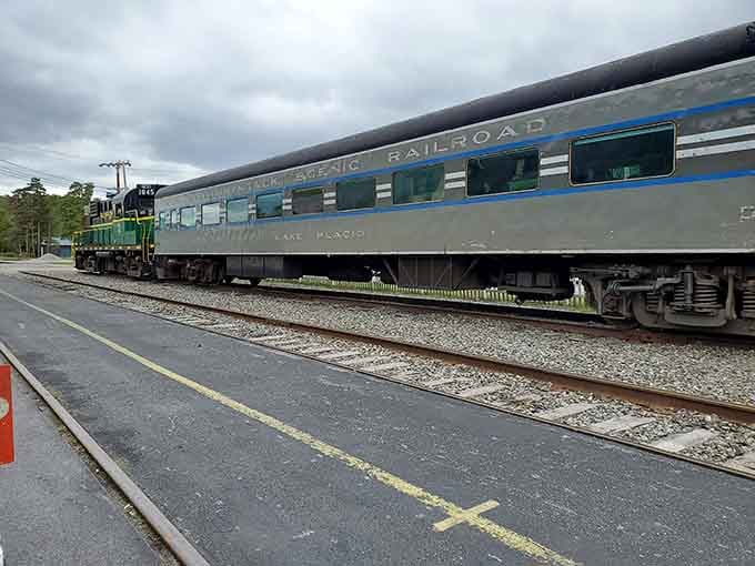 The Adirondack Railroad's vintage coaches waiting at the platform, ready to whisk you into upstate New York's wilderness.