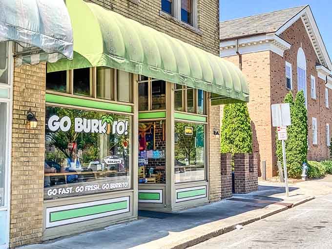 That cheerful green awning beckons like a beacon of hope for anyone whose stomach is staging a revolt.