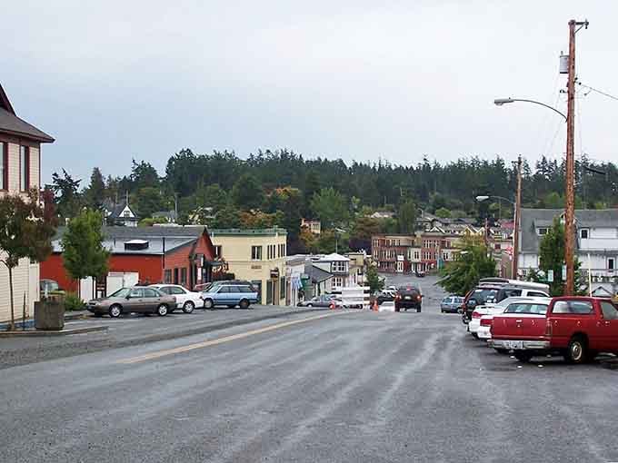 Main Street looks like someone asked Norman Rockwell to paint a Pacific Northwest postcard and he absolutely nailed it.