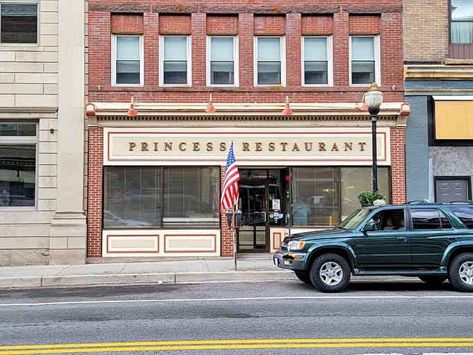 That classic storefront has been welcoming hungry travelers since before Instagram made everything a photo op.