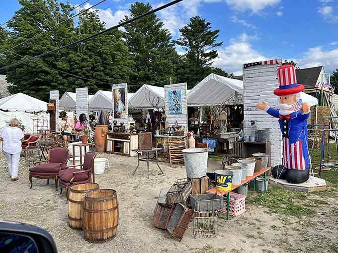 White tents stretch endlessly across fields where treasure hunters roam like happy, well-fed pilgrims seeking vintage gold.