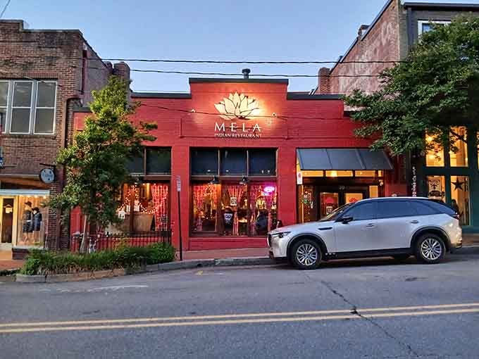 Evening glow transforms the red exterior into something magical, practically demanding you plan your next visit before leaving this one.