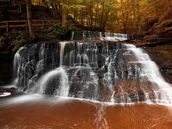 Nature's own masterpiece, cascading in perfect tiers like a wedding cake made of pure liquid magic.