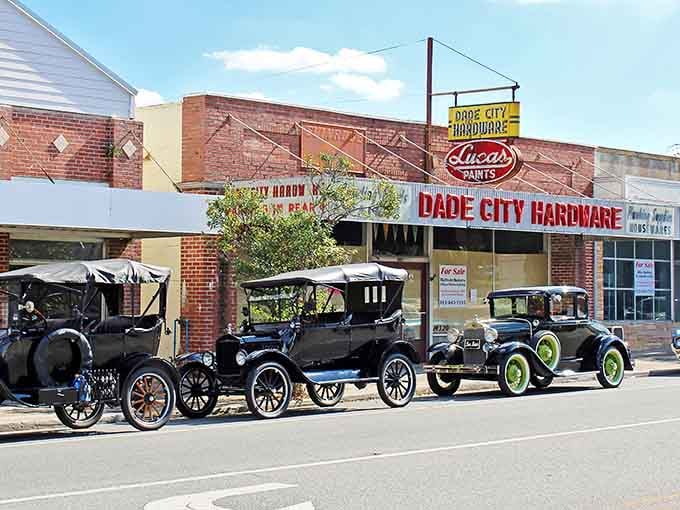 Classic cars meet classic storefronts in a scene that makes you nostalgic for an era you probably didn't even live through.