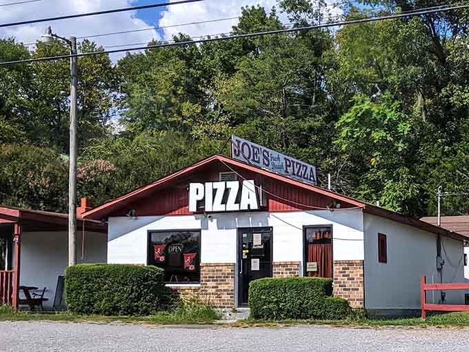 Tucked among the trees in Woodville, this unassuming building holds pizza secrets that'll make you rethink everything about roadside dining.