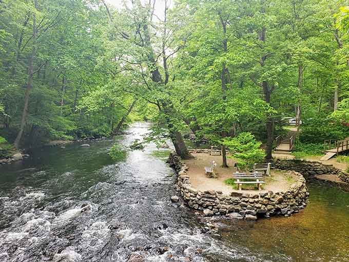 This stone circle by the river looks like nature's own amphitheater, minus the overpriced concert tickets and parking nightmares.