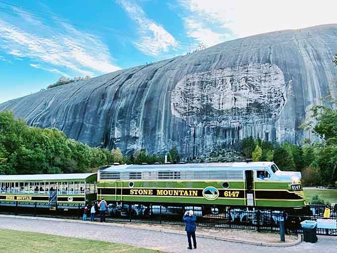 This classic train against that massive granite formation is the kind of pairing that makes photographers weak in the knees.