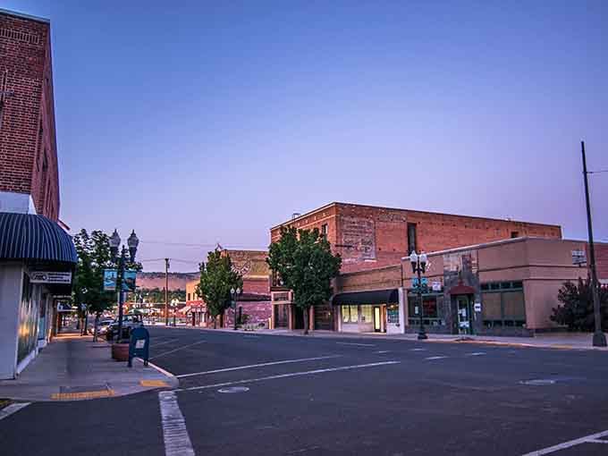 Tree-lined streets and historic storefronts create a downtown that feels refreshingly real, not manufactured.