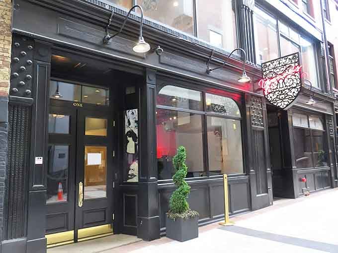 Behind that elegant black facade with its brass fixtures lies a dining experience that'll make you forget you're in the 21st century.