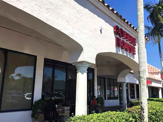 That Mediterranean-inspired exterior practically whispers "something special happens here" before you even walk through the door.