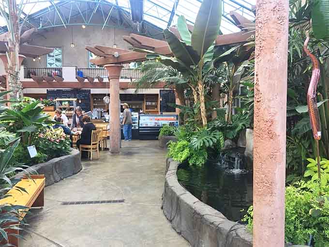 That peaceful water feature and towering palms create an oasis where your biggest worry is choosing between sandwiches.