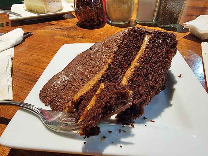 Galaxy chocolate cake towers high enough to require a strategic eating plan and possibly a nap afterward.