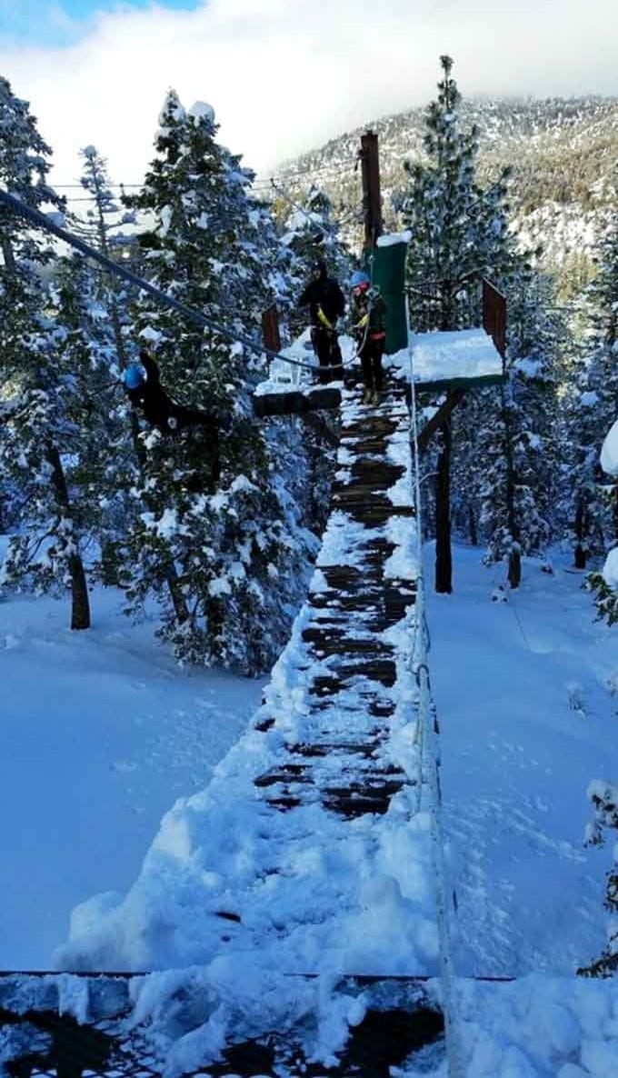 Winter transforms the course into a snowy wonderland, because apparently some people enjoy freezing and flying simultaneously.