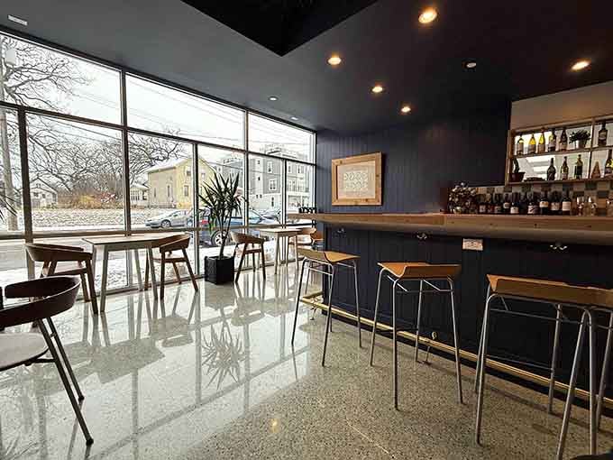 The bar area gleams with bottles backlit like a shrine to the art of German brewing and winemaking.