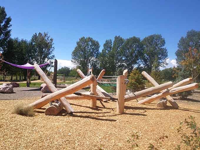 Rio Grande Farm Park's playground equipment invites families to enjoy fresh air and mountain views without admission fees.