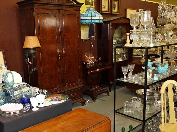 Crystal and glassware catching light like a disco ball made entirely of heirloom treasures.