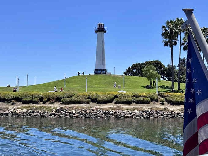 The Long Beach lighthouse rises on its grassy hill, a postcard view that comes free with your ride.
