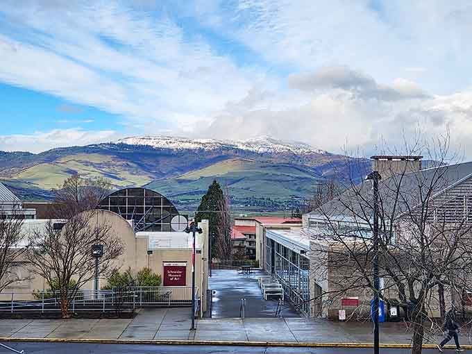 Snow-dusted mountains frame the university campus, reminding students that studying here comes with serious scenic perks.