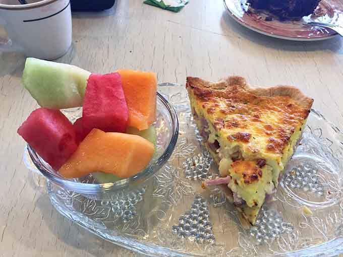 This isn't your average quiche, it's a flaky-crusted masterpiece served with fresh fruit that makes breakfast feel downright fancy.