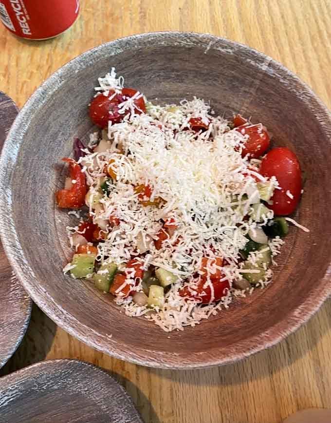 Sopska salad with its mountain of grated cheese looks like someone finally understood that vegetables need proper accessorizing to shine.