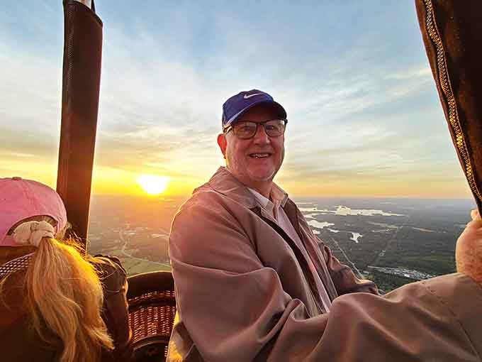 That grin captures the exact moment someone realizes they're actually doing this crazy, wonderful thing they've always dreamed about.