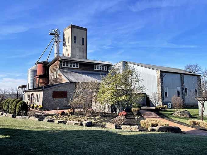 Industrial bourbon architecture meets landscaped gardens, proving function and beauty can absolutely coexist in perfect harmony.