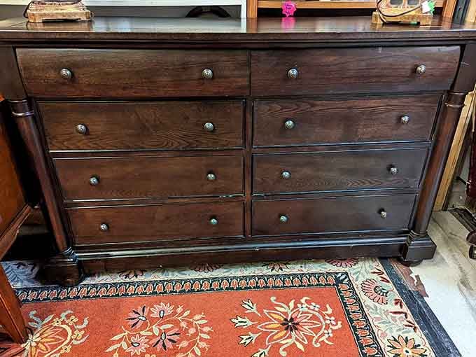 This handsome wooden dresser awaits its new home, offering quality furniture at prices that won't require a second mortgage.
