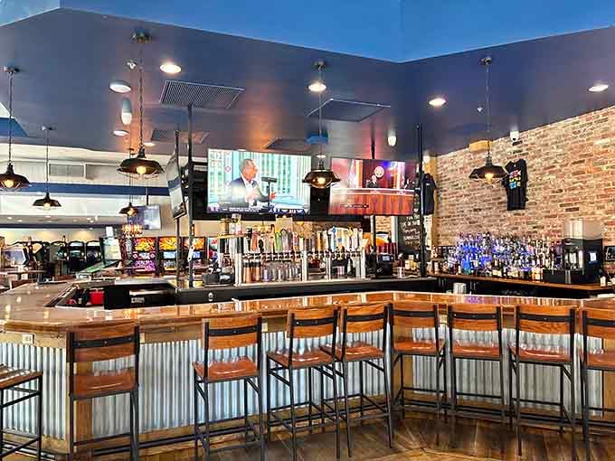 The bar gleams with promise, offering craft beers and cocktails to complement your gaming adventures perfectly.