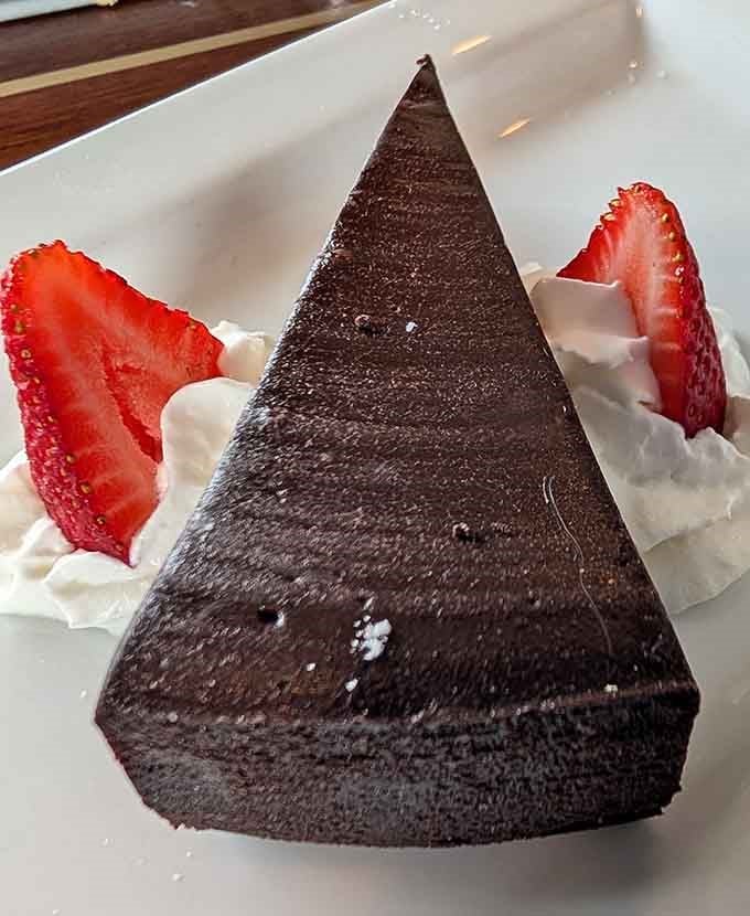 This towering triangle of chocolate cake doesn't mess around when it comes to serious dessert business.