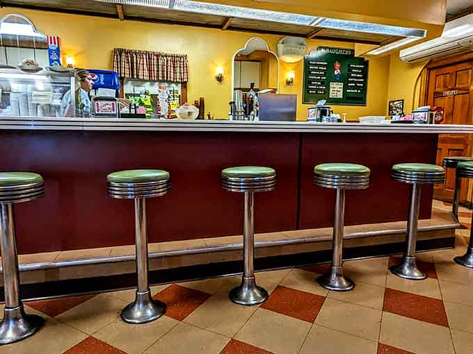 Counter seating with chrome stools that's seen more coffee refills and good conversations than most therapists' offices combined.